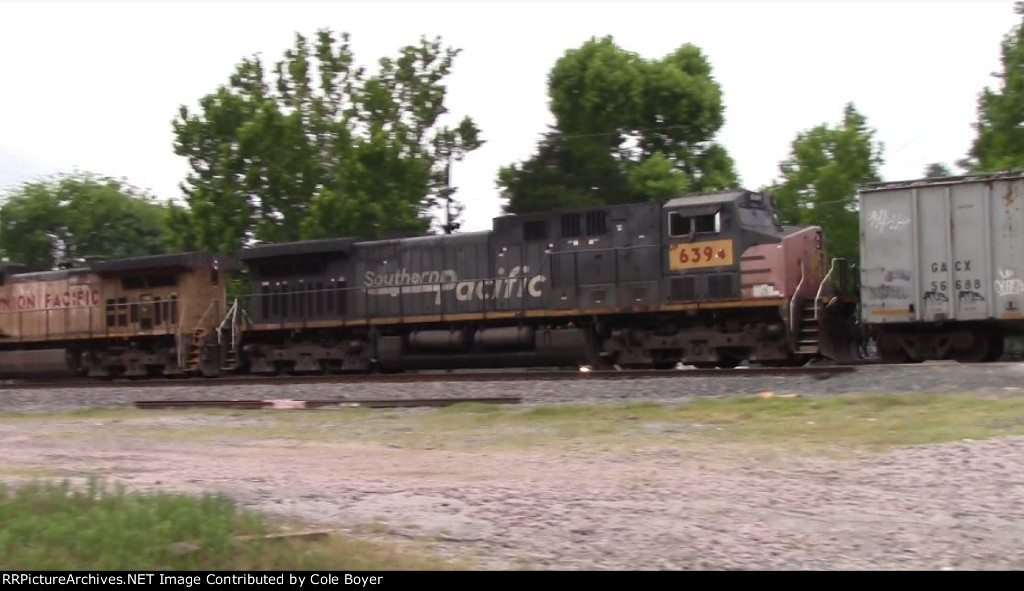 UP 6394 (Patched SP) trails on UP Ethanol